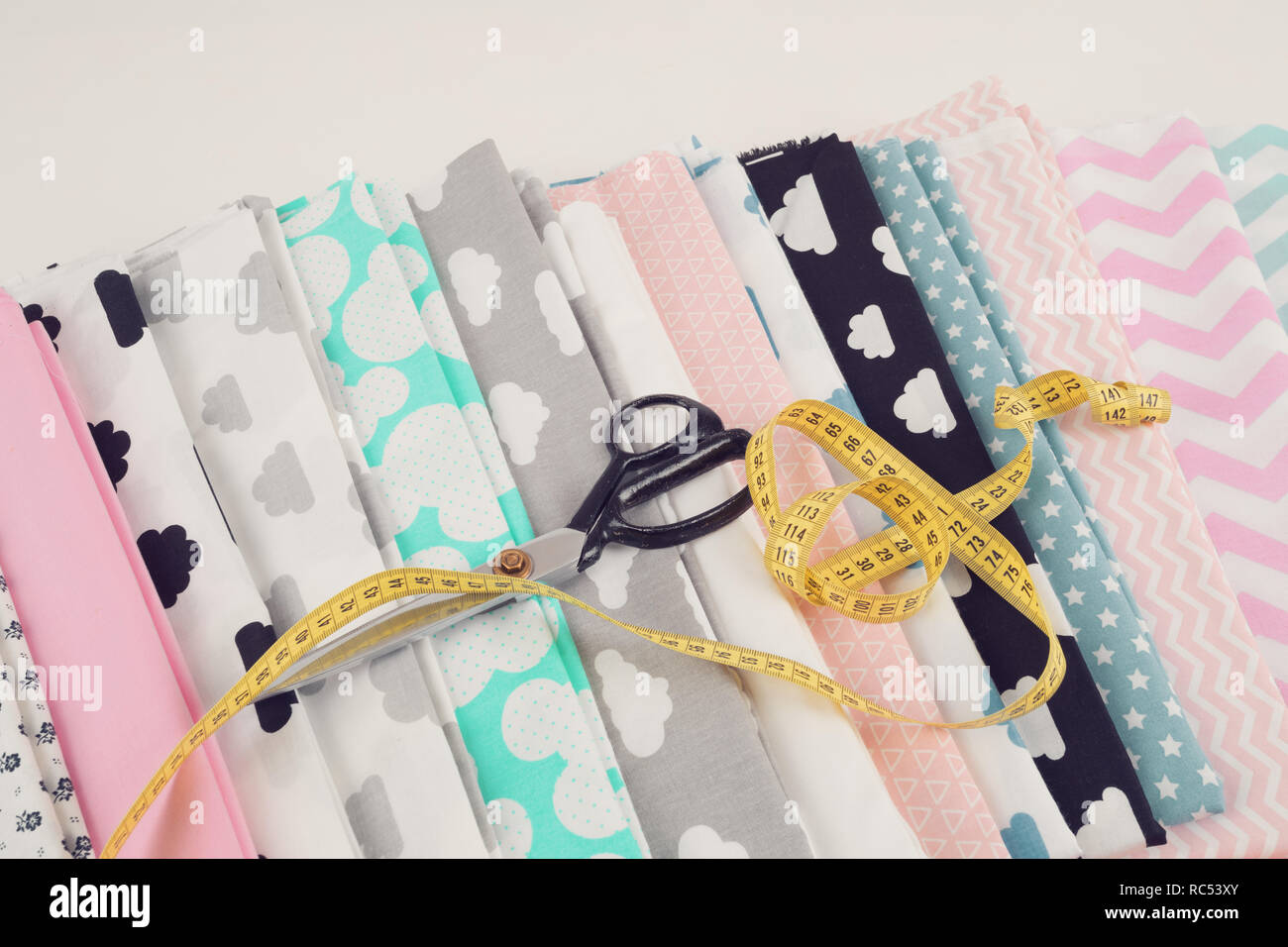 Stack of 100% cotton fabric material for tailor or homework, sewing ...