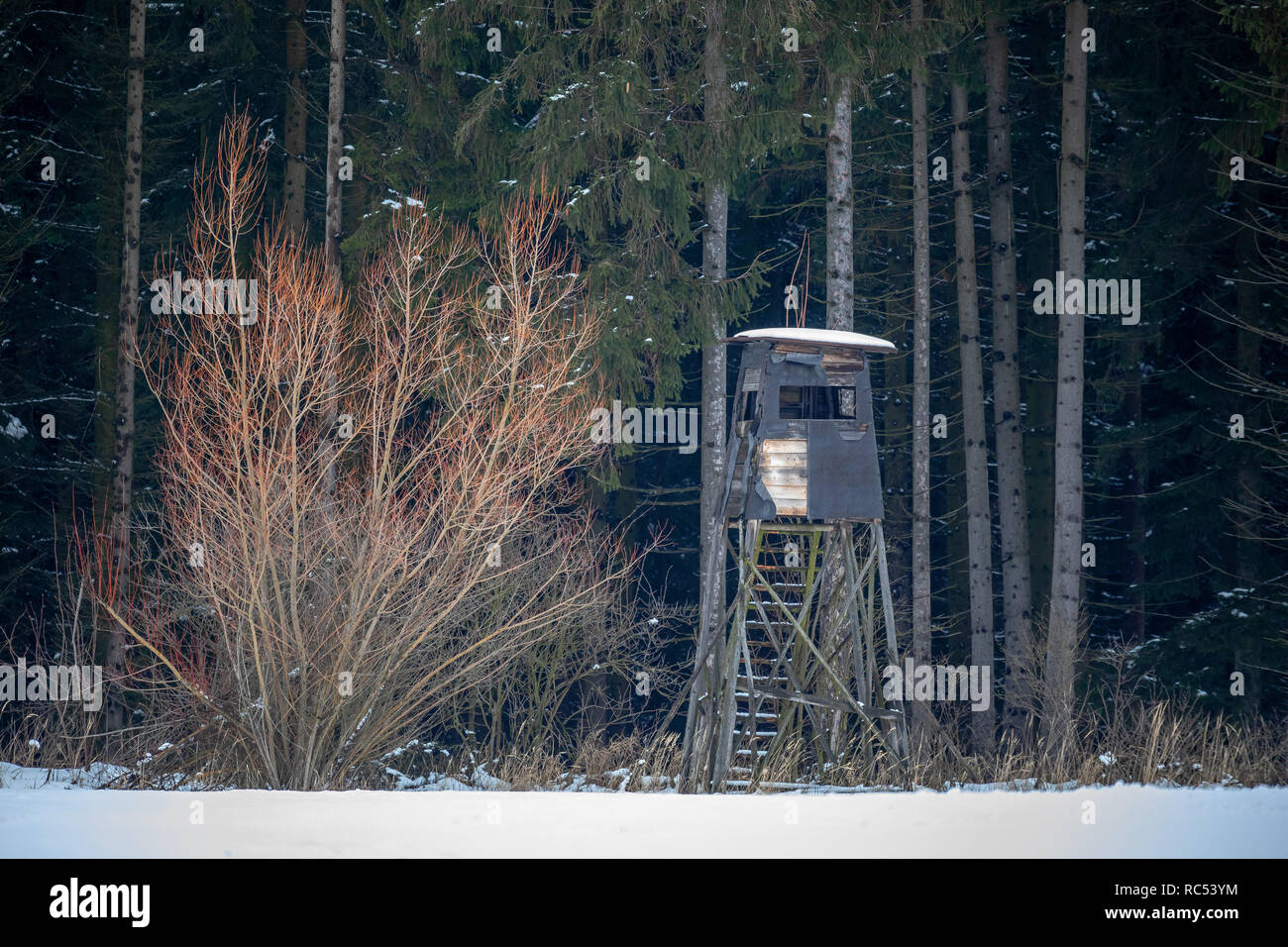 Snow landscape with hunting tower hi-res stock photography and images ...