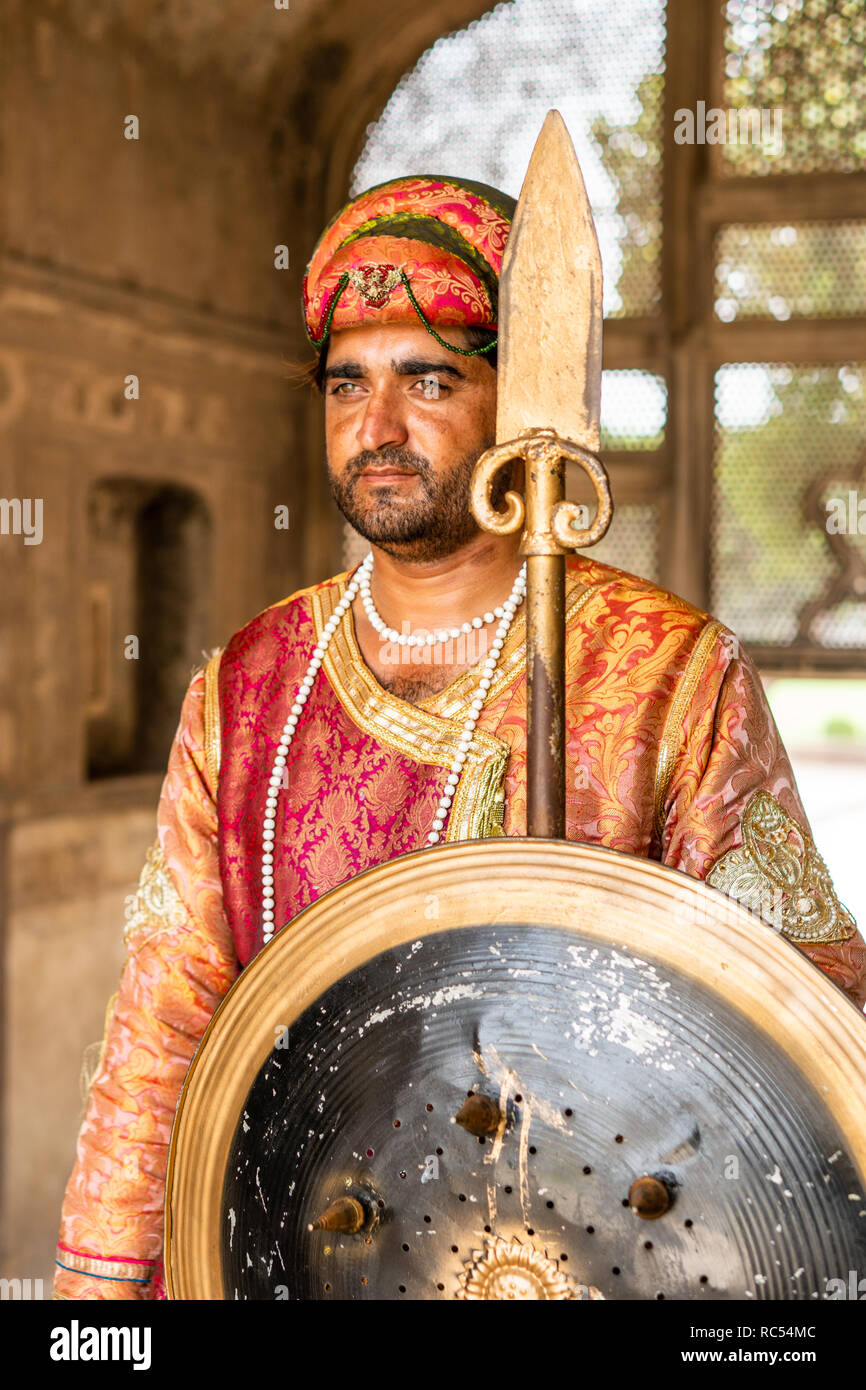 Lahore, Pakistan - August 5, 2018: Guard in historical costume in ... Lahore, Pakistan - August 5, 2018: Guard in historical costume in ...