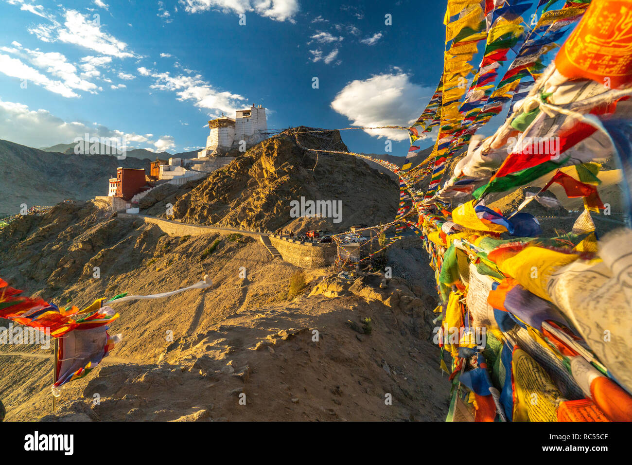 Buddhist Prayer flags connecting two peaks of Peak of Victory above Leh ...