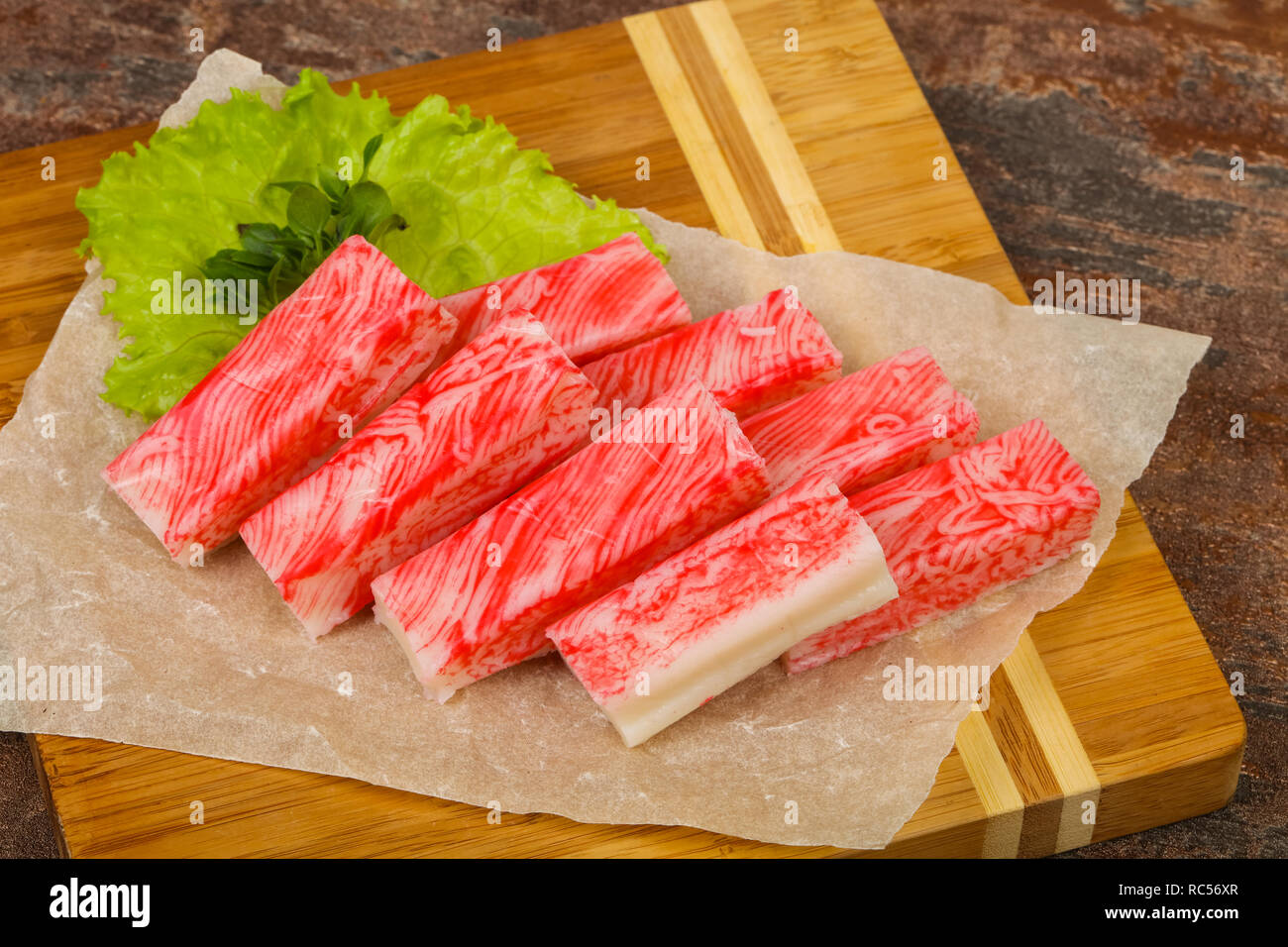 Crab surimi stick served salad leaves Stock Photo - Alamy