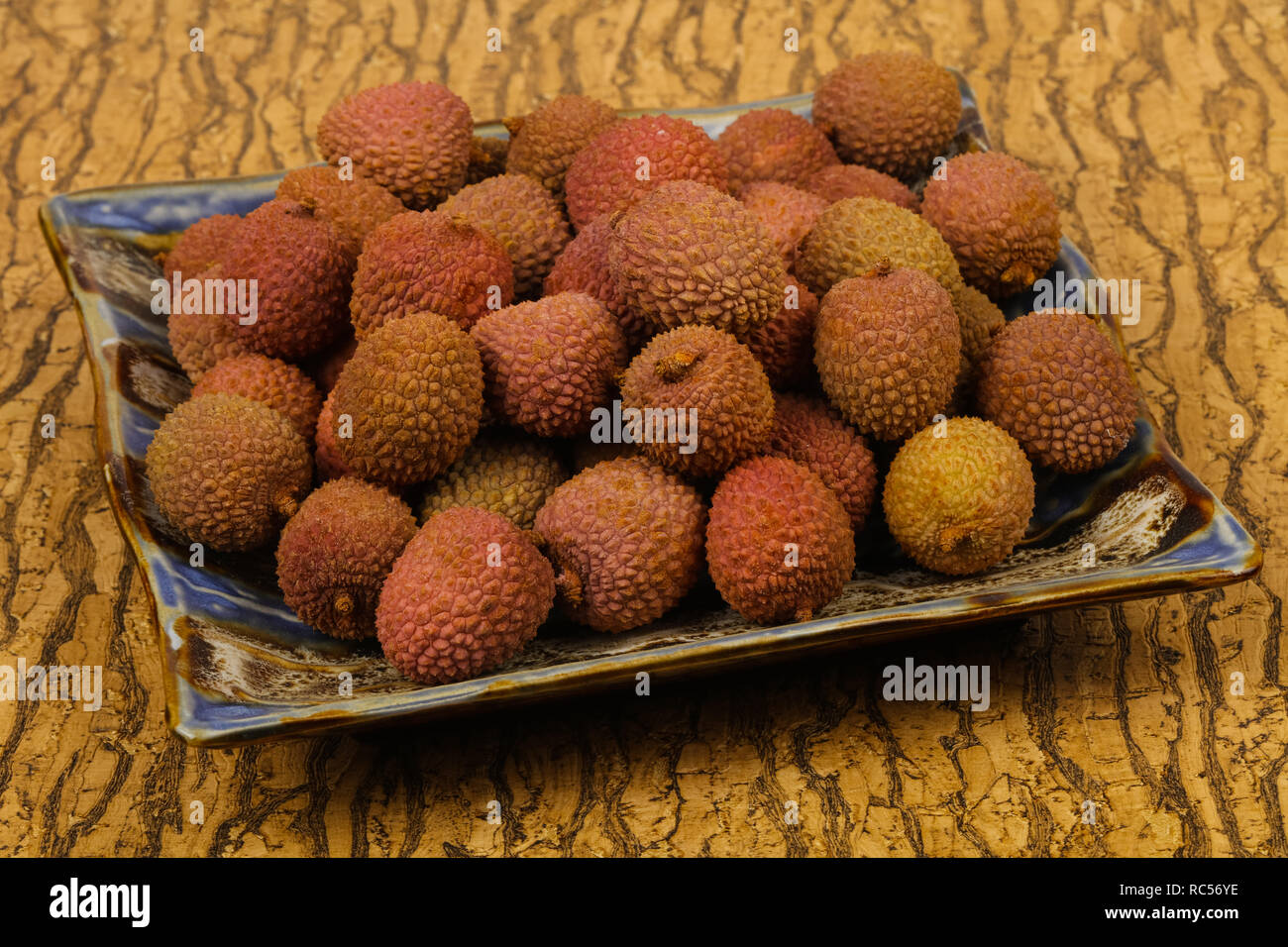 Tropical fruit lychee in the bowl Stock Photo - Alamy
