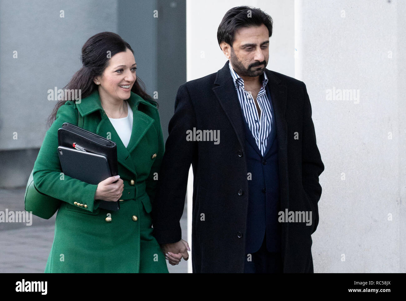 Tasmina Ahmed-Sheikh (left) and her husband Zulfikar Sheikh arrive for ...