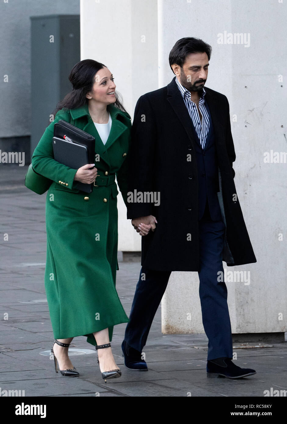 Tasmina Ahmed-Sheikh (left) and her husband Zulfikar Sheikh arrive for ...