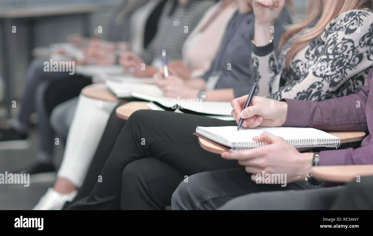 Business people taking notes briefing hi-res stock photography and ...