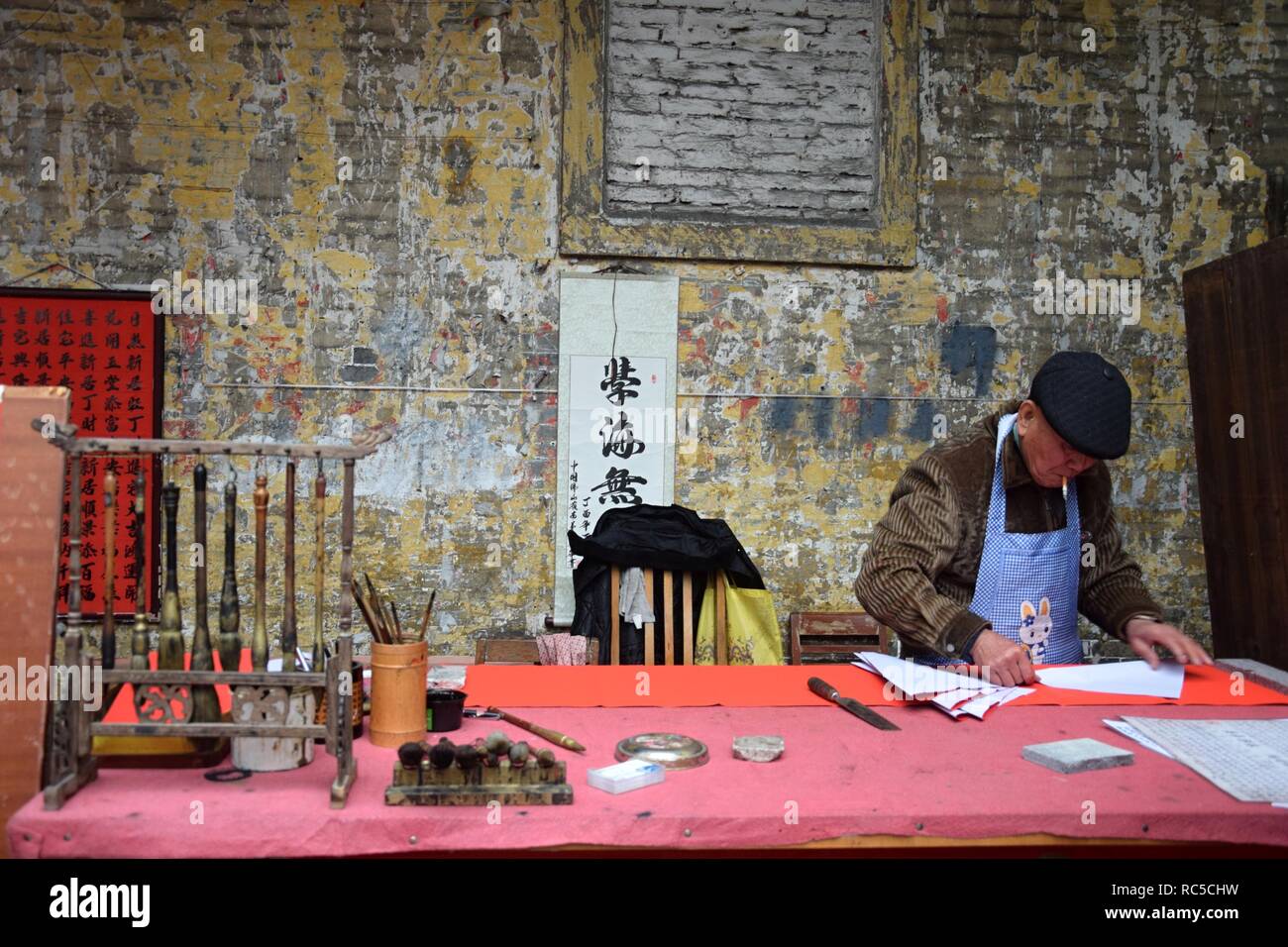 Old chinese man writing calligraphy hi-res stock photography and images ...