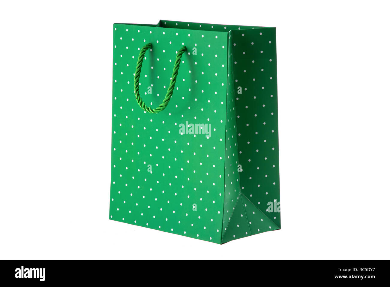 Green paper bag on white background Stock Photo - Alamy