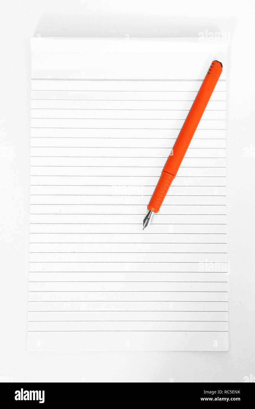 Picture of blank notepad with orange pen. Isolated on the white ...