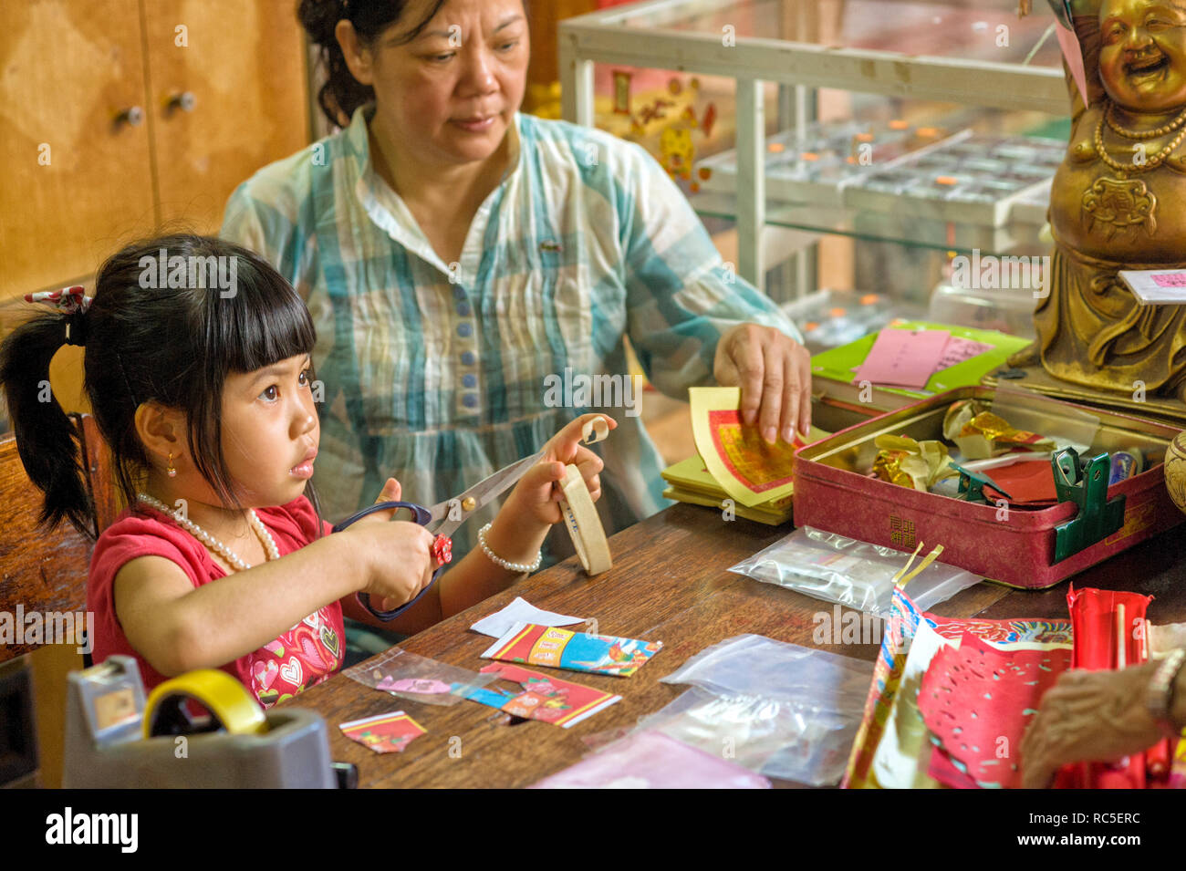 preparation of votive paper in the Guan Di Temple in Kuala Lumpur ...