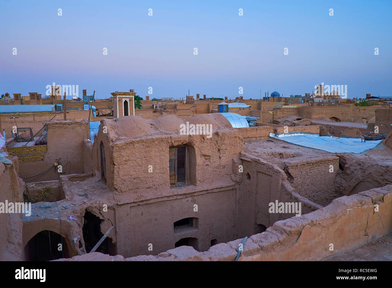 The old town of Yazd consists of the maze of clay buildings, some of ...