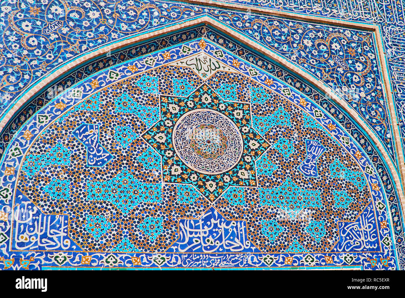 Details of rich tiled decoration on the portal of Jameh Mosque, the ...