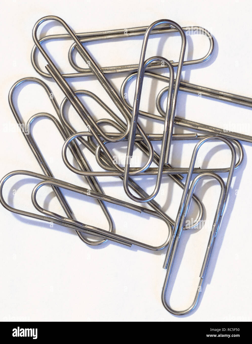 The paper clip is used to fasten paper sheets.It's a stationery tool ...