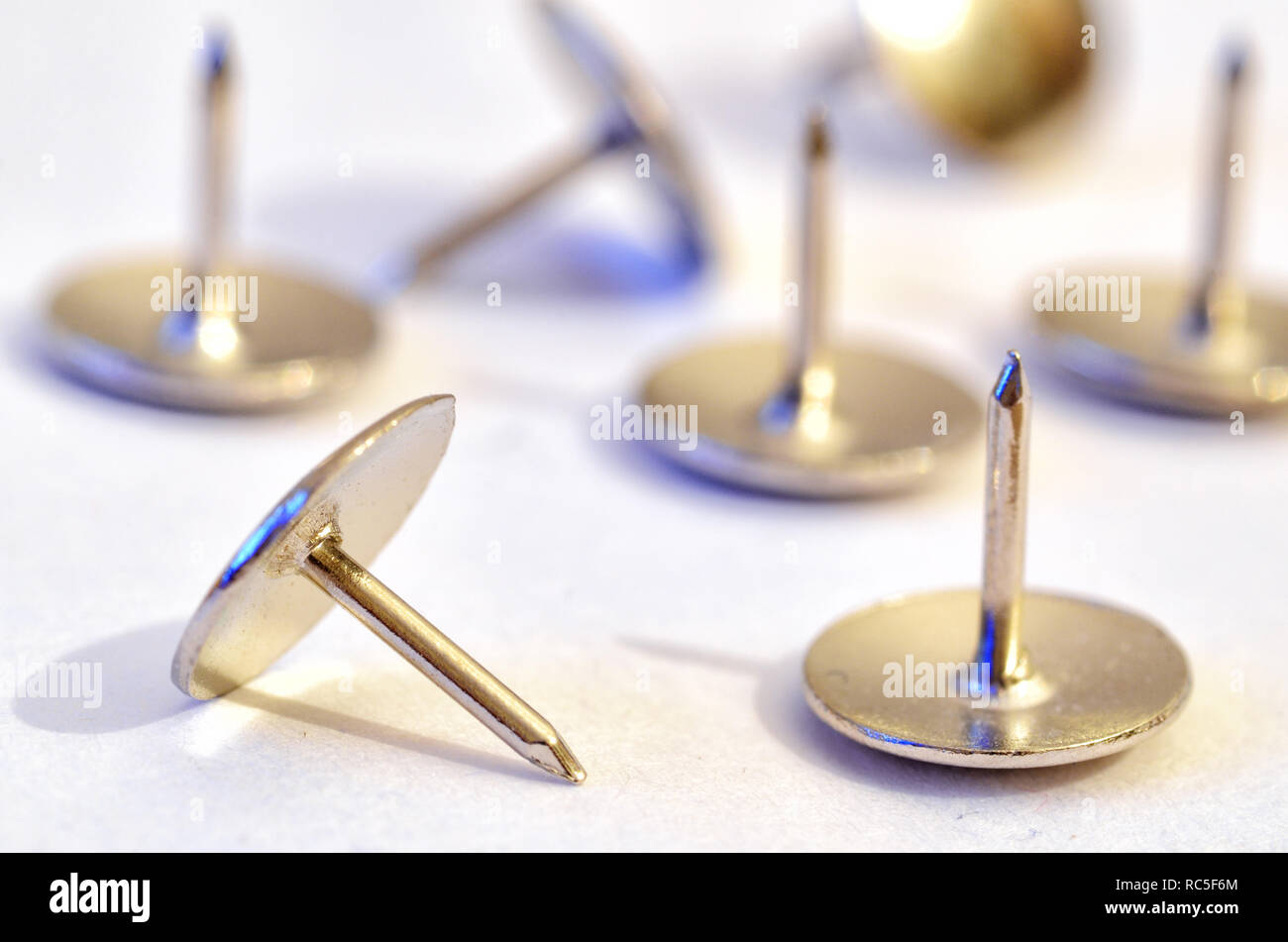 needle for fastening sheets of paper.This stationery tool is widely ...