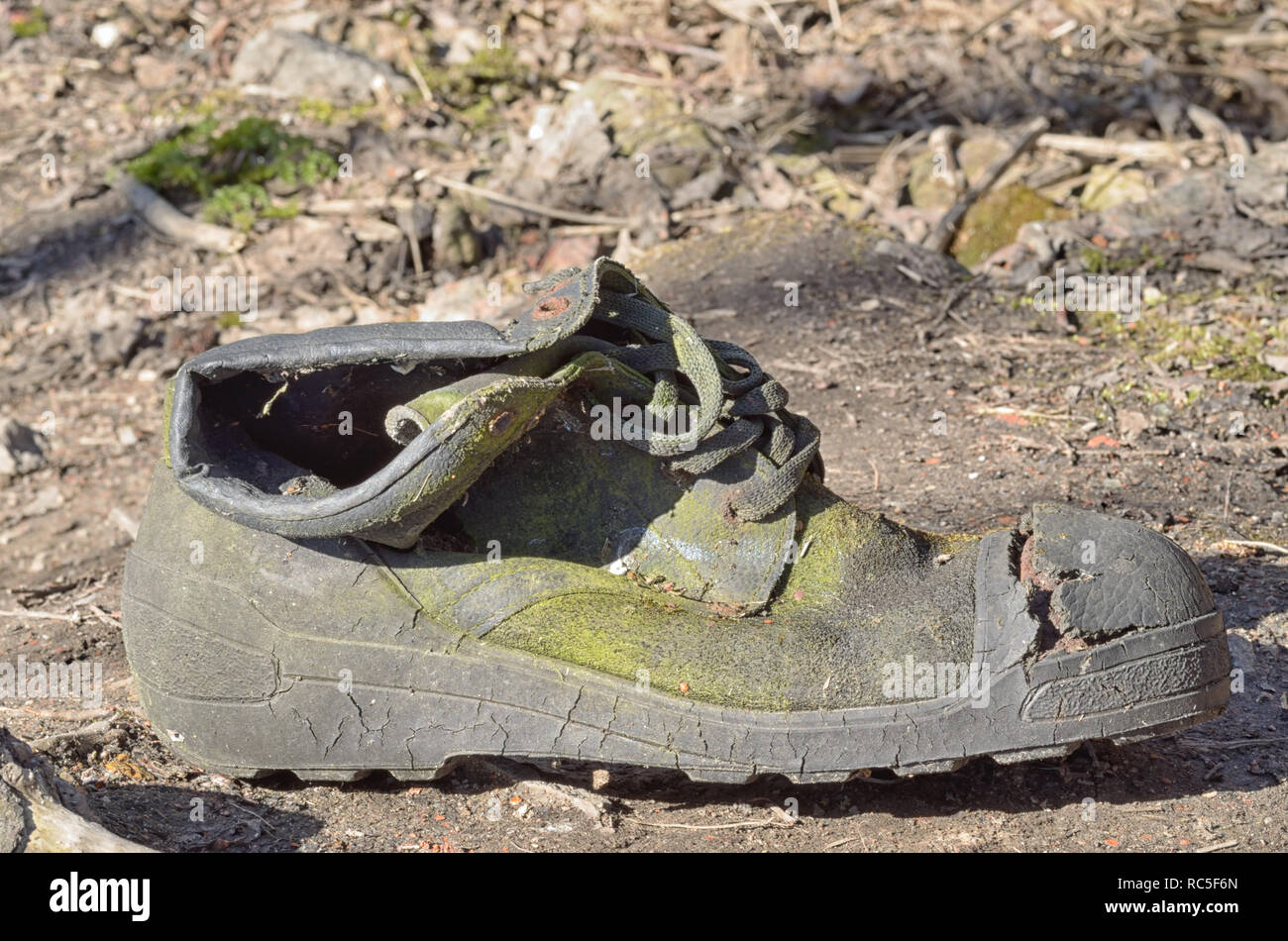 Torn shoes hi-res stock photography and images - Alamy