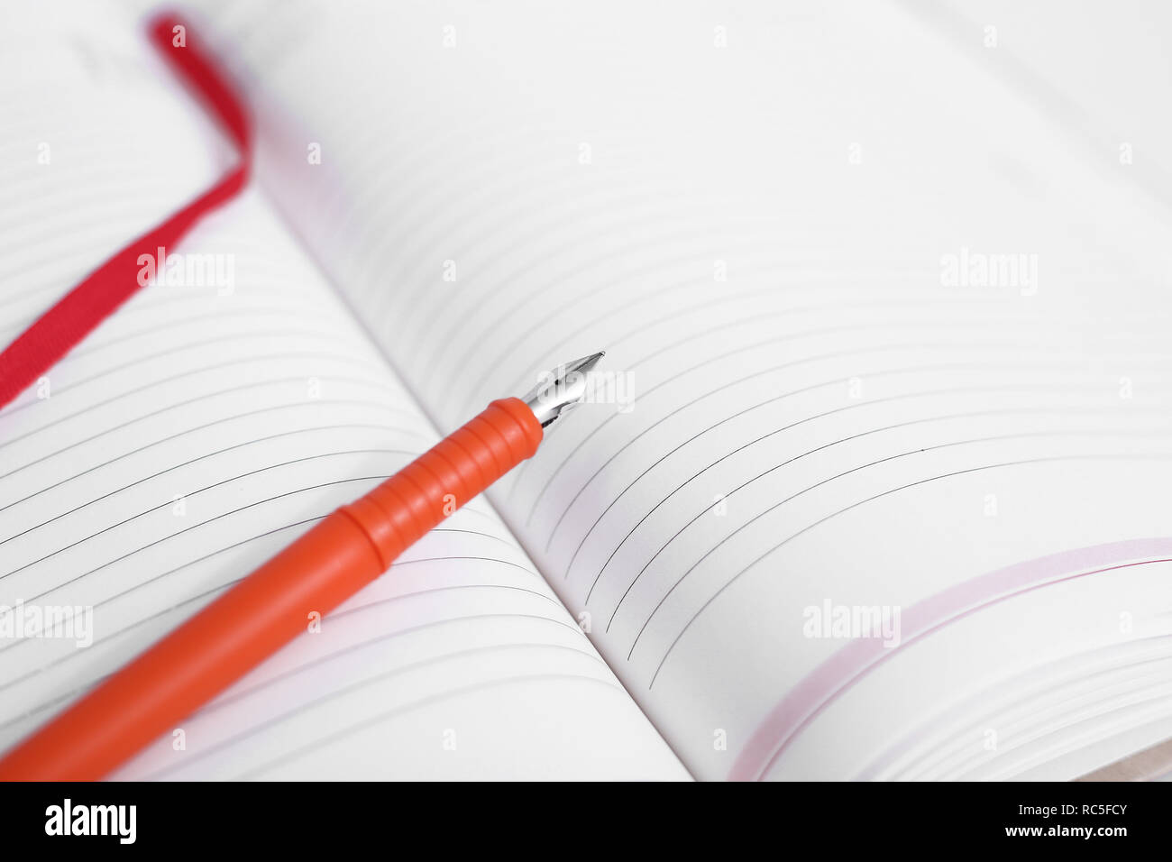 Picture of diary with pen. Isolated on the white background Stock Photo ...