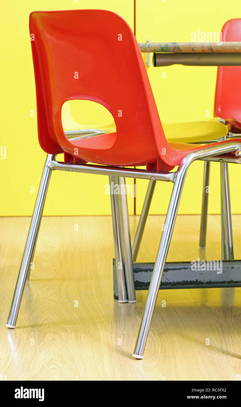 small red chair in the classroom of school Stock Photo - Alamy