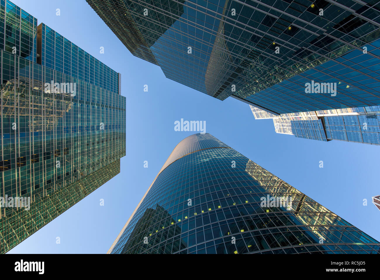 perspective bottom up view on business district skyscrapers Stock Photo ...
