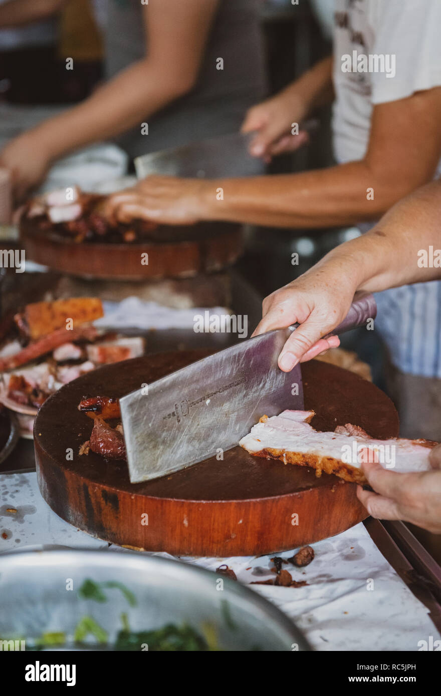Man chopping meat at meat market hi-res stock photography and images ...