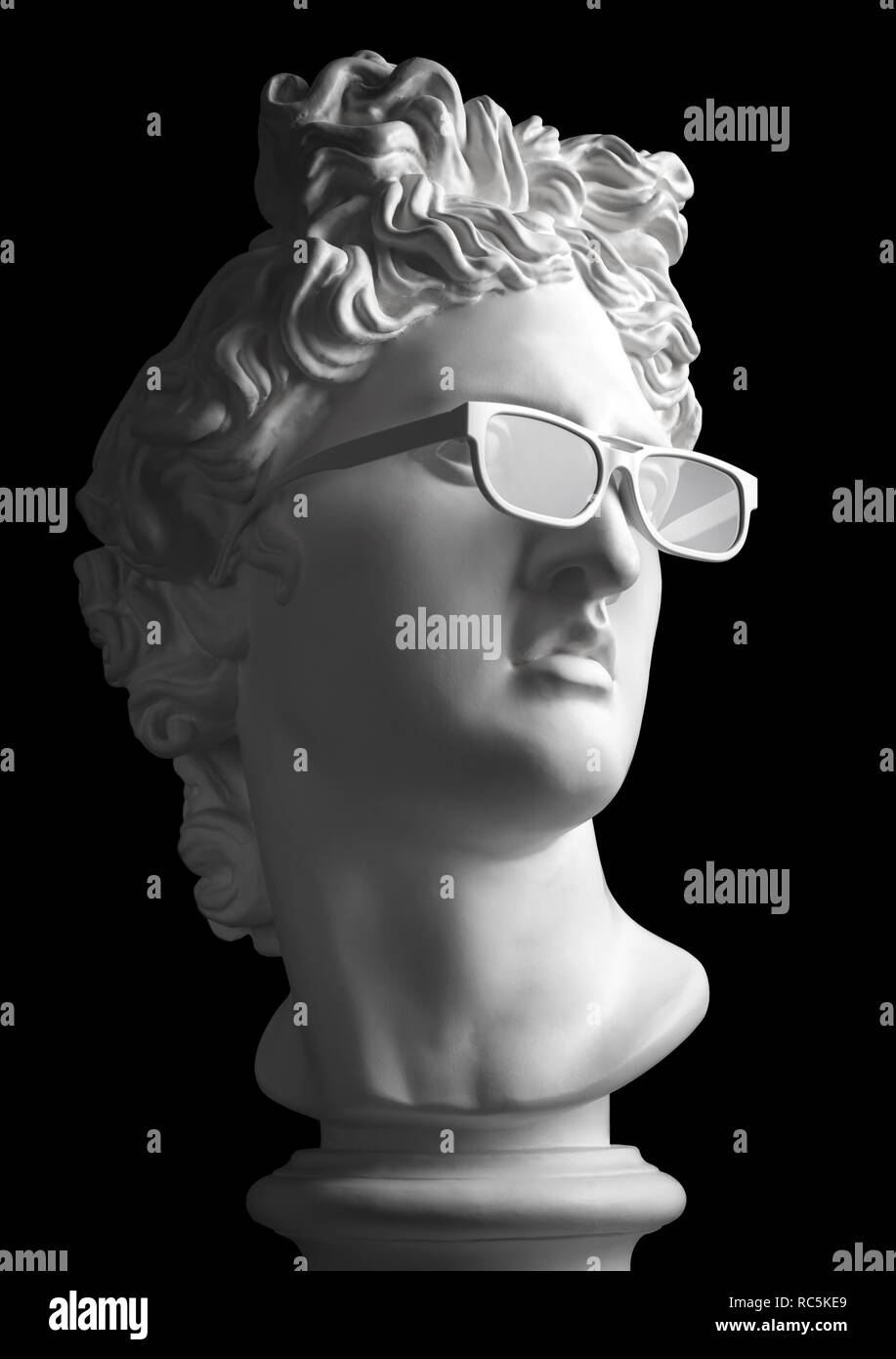 Gypsum statue of Apollo's head on a black background. Statue. Isolated ...