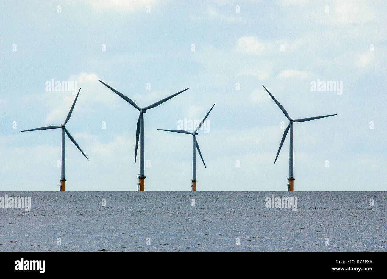 Windpower windmills in river Mersey Stock Photo - Alamy