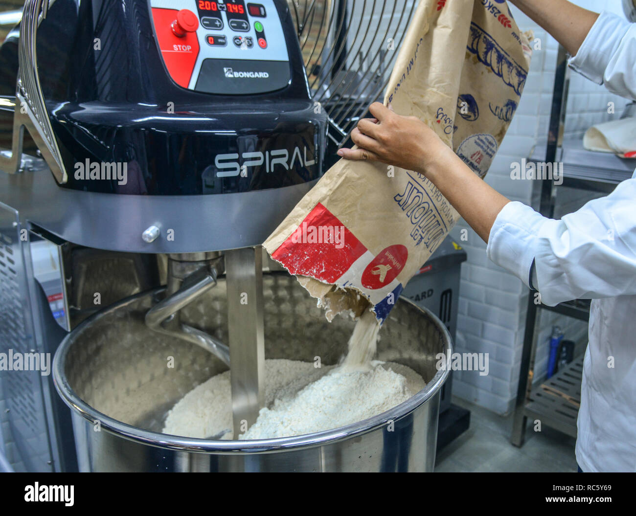 Mixing bread dough vietnam hi-res stock photography and images - Alamy