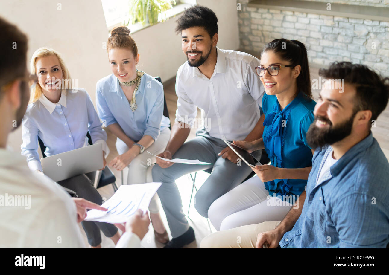 Happy creative team in office. Business, startup, design, people and ...