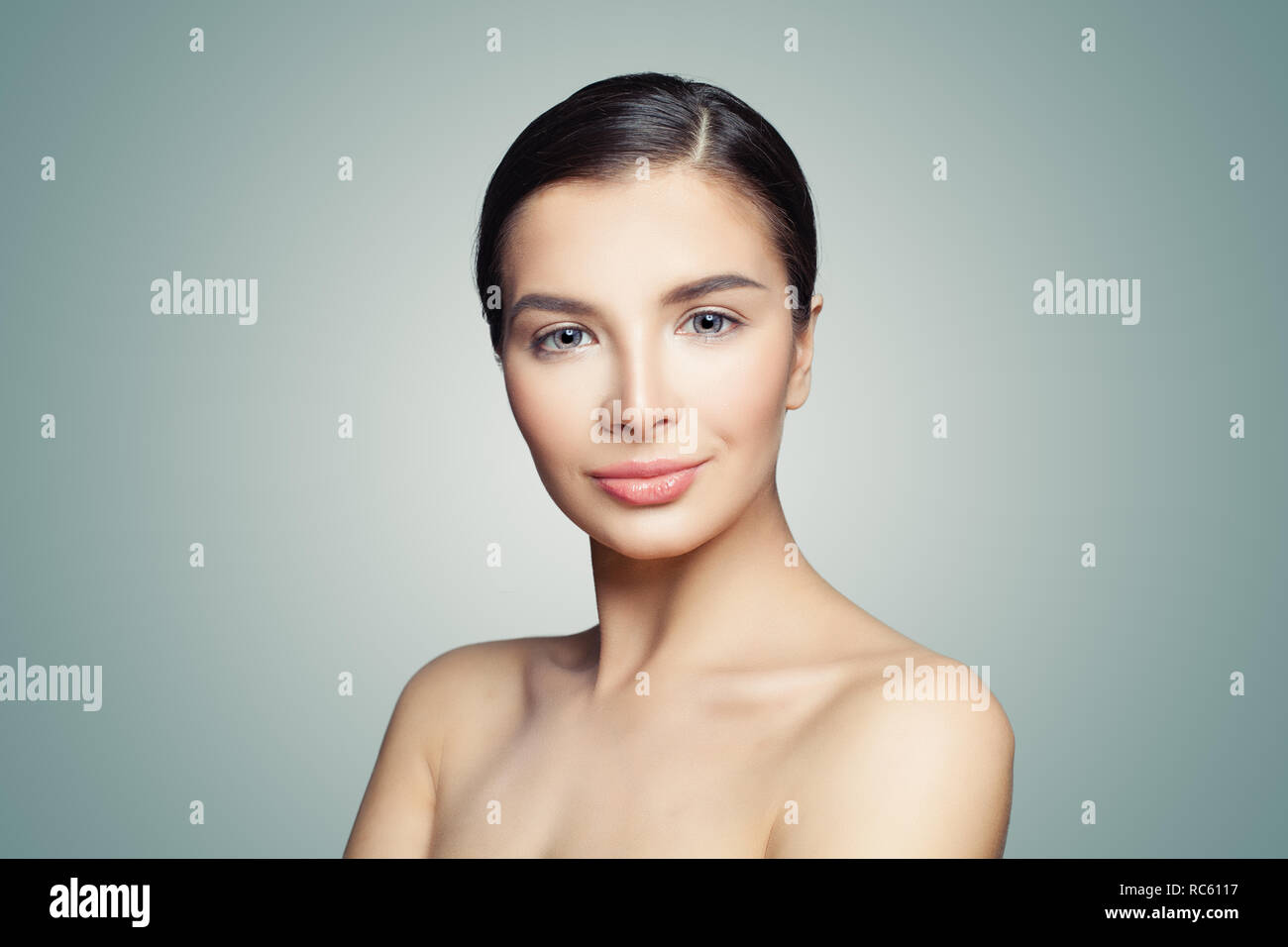 Beautiful face. Healthy woman with perfect clear skin. Facial treatment ...