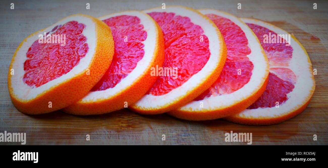 Grapefruit slice hi-res stock photography and images - Alamy