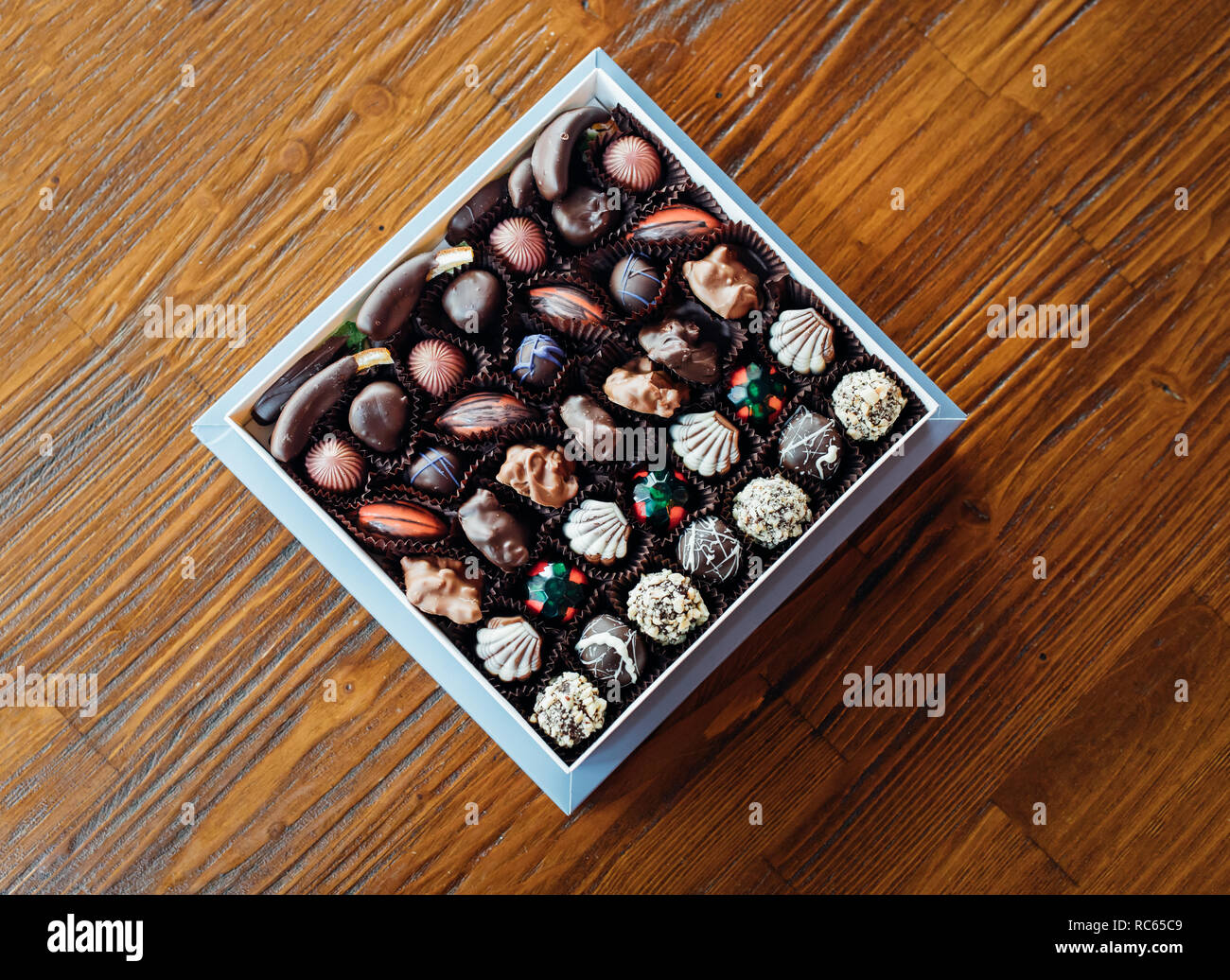 Handmade chocolates or candies in the box. This chocolate gift are ...