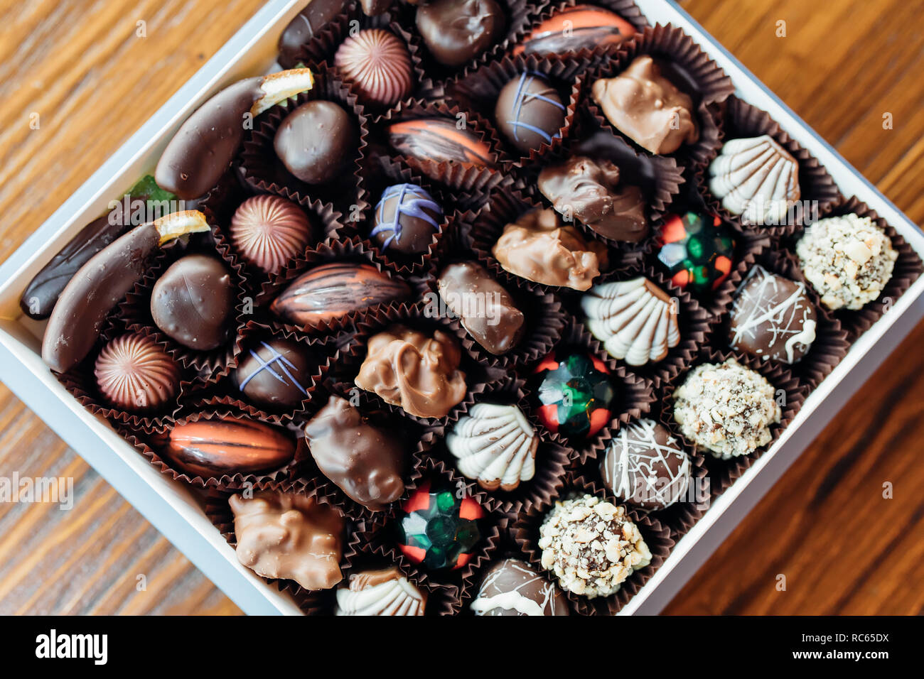 Handmade chocolates or candies in the box. This chocolate gift are ...