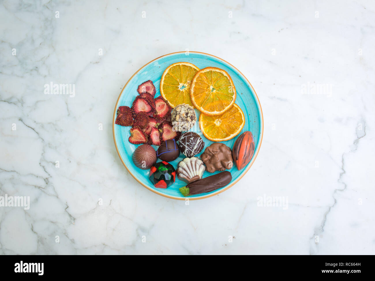 Handmade chocolates or candies in the plate. This is dessert plate and ...