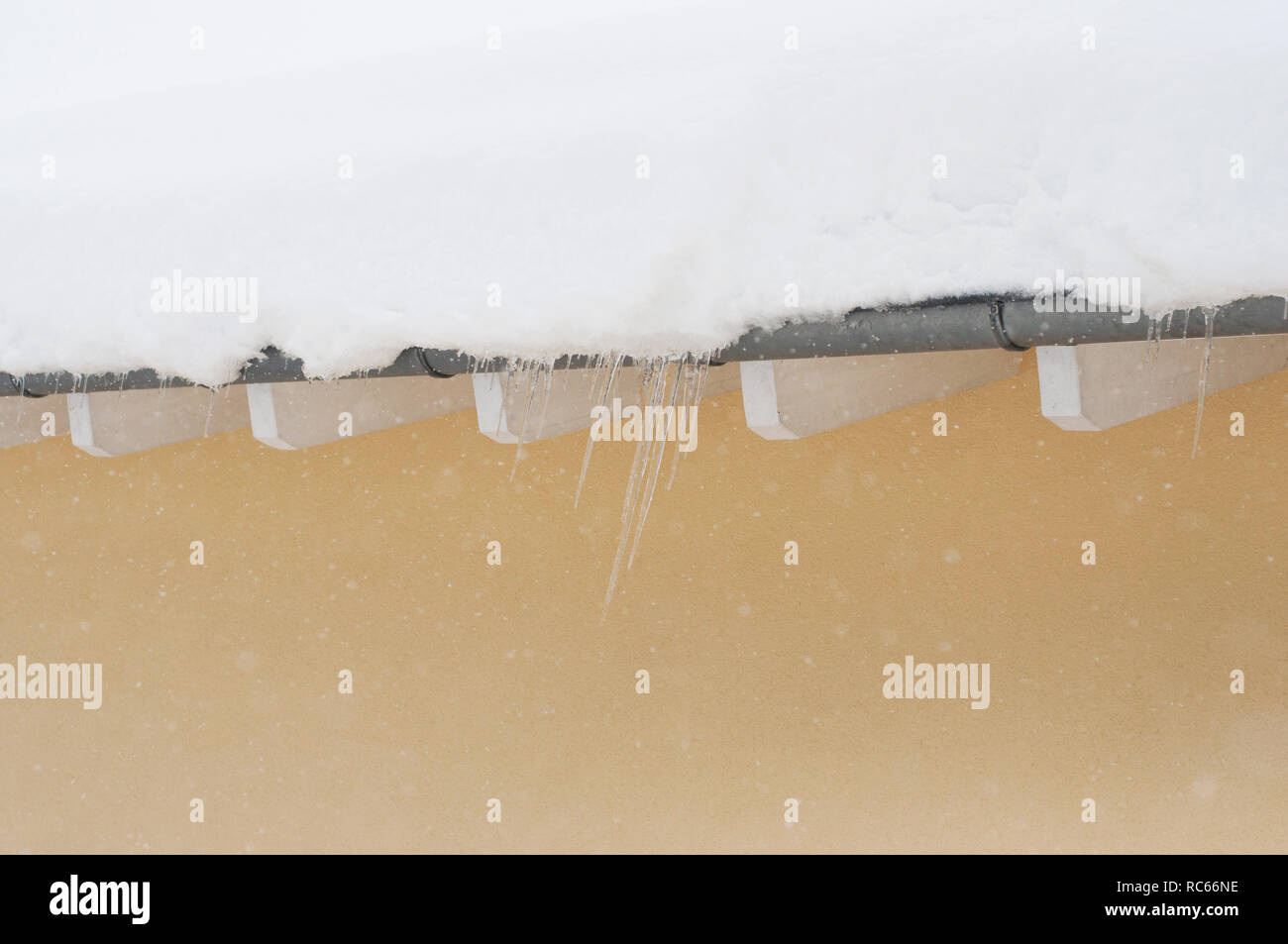 Snow on roof after two days of snowfalls, Snow cyclone in Europe. House ...
