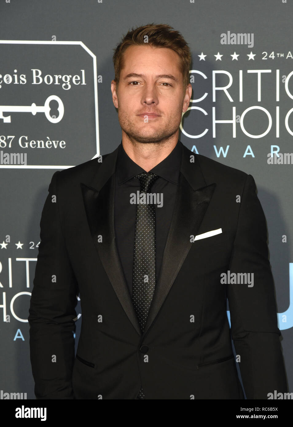 LOS ANGELES, CALIFORNIA - JANUARY 13: Justin Hartley attends the 24th ...