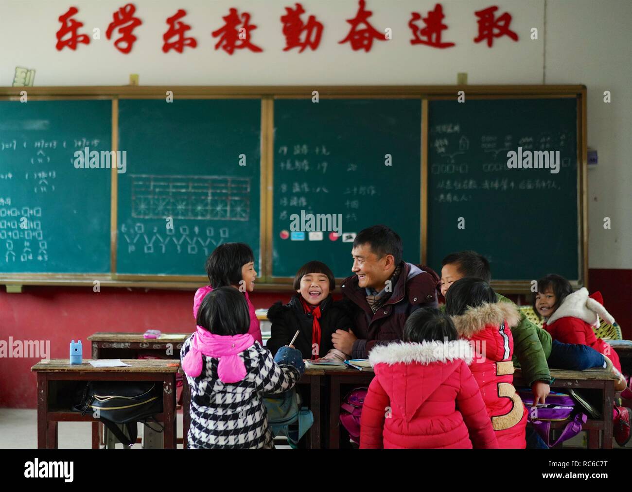 (190114) -- NANCHANG, Jan. 14, 2019 (Xinhua) -- Principal Zhang ...