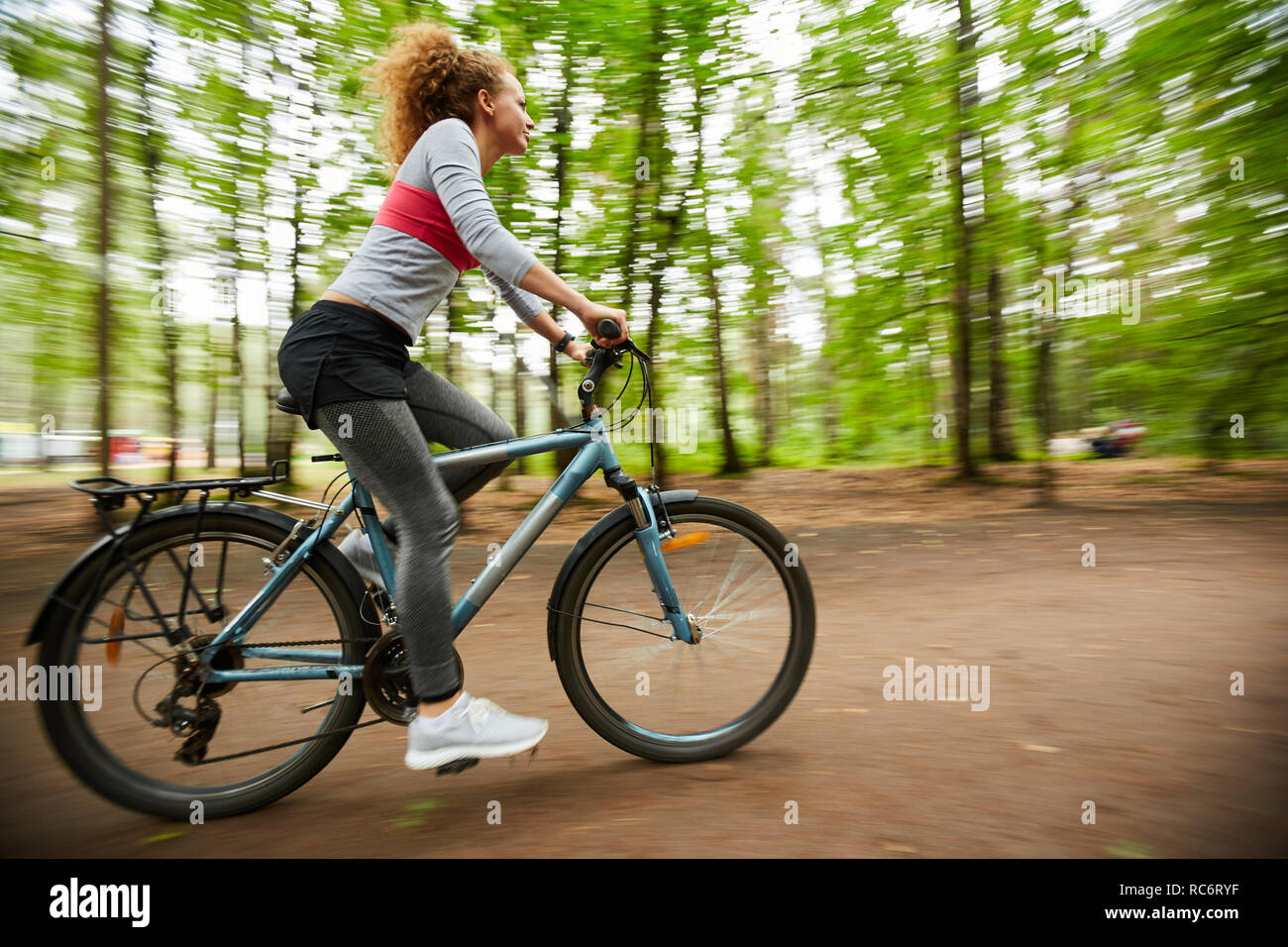 Moving on bike Stock Photo - Alamy