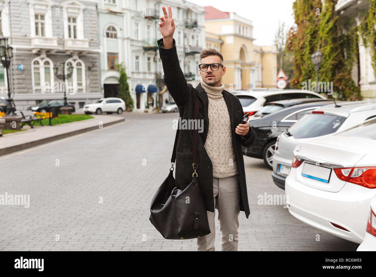 Man Catching A Cab High Resolution Stock Photography and Images - Alamy