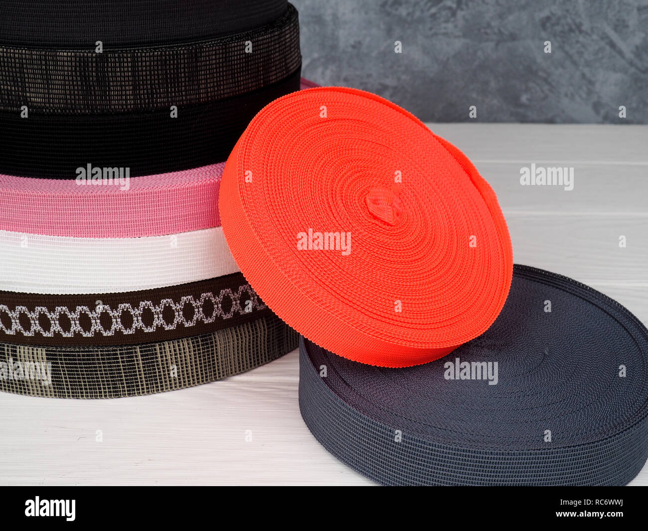 Ribbon of different colors in coils Stock Photo - Alamy