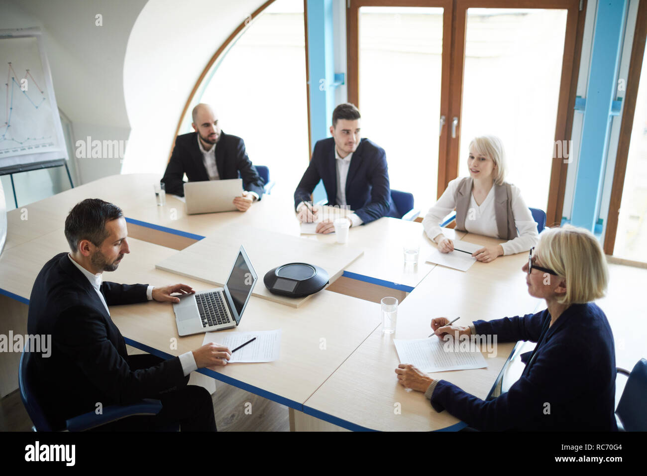 Interview in boardroom Stock Photo - Alamy