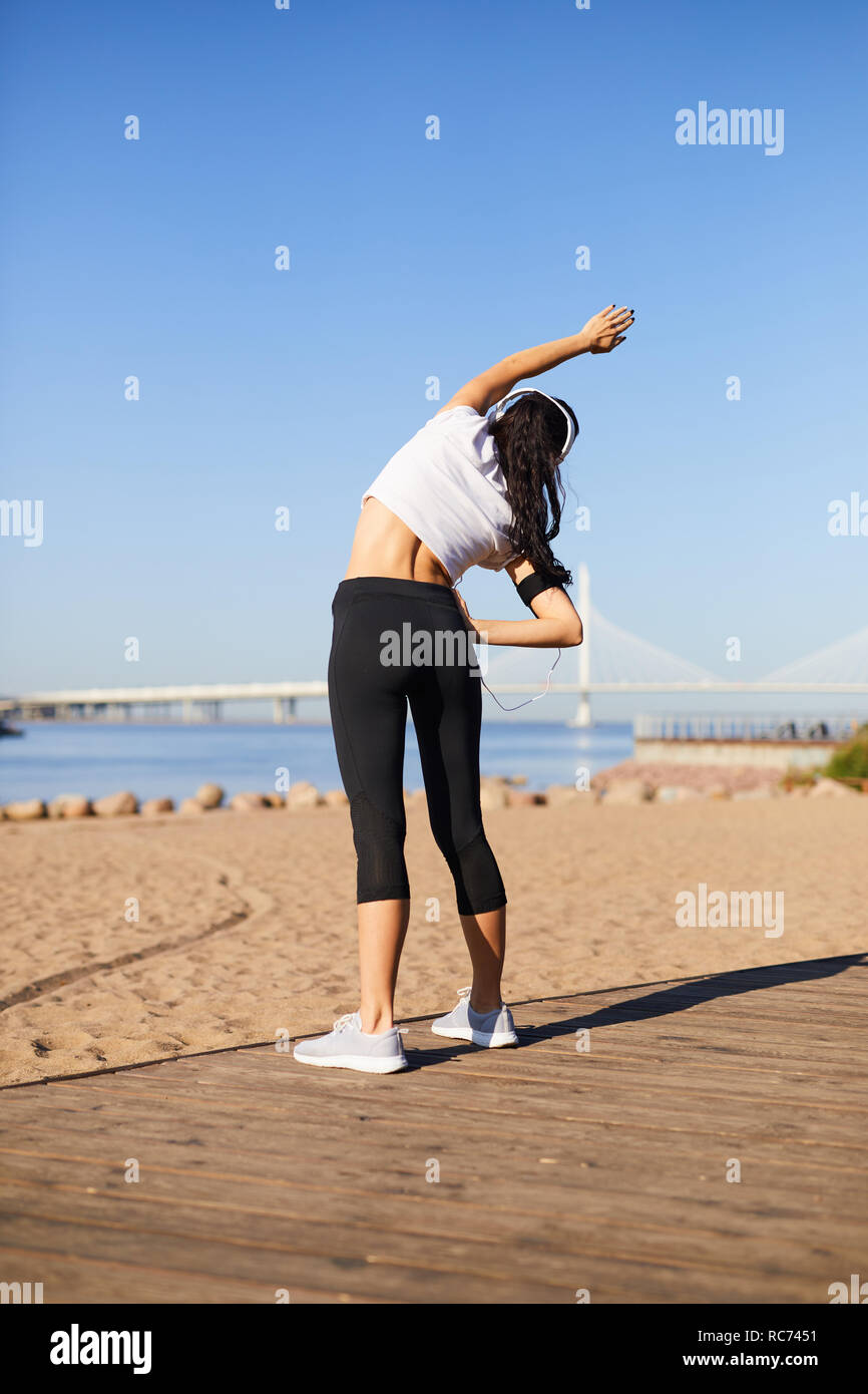 Runner stretching warmup hi-res stock photography and images - Alamy