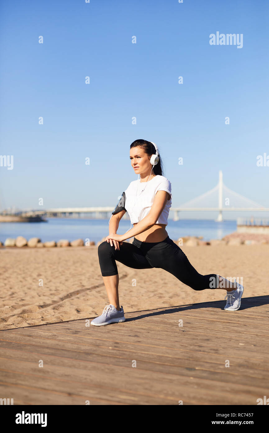 Leg stretching after running Stock Photo - Alamy