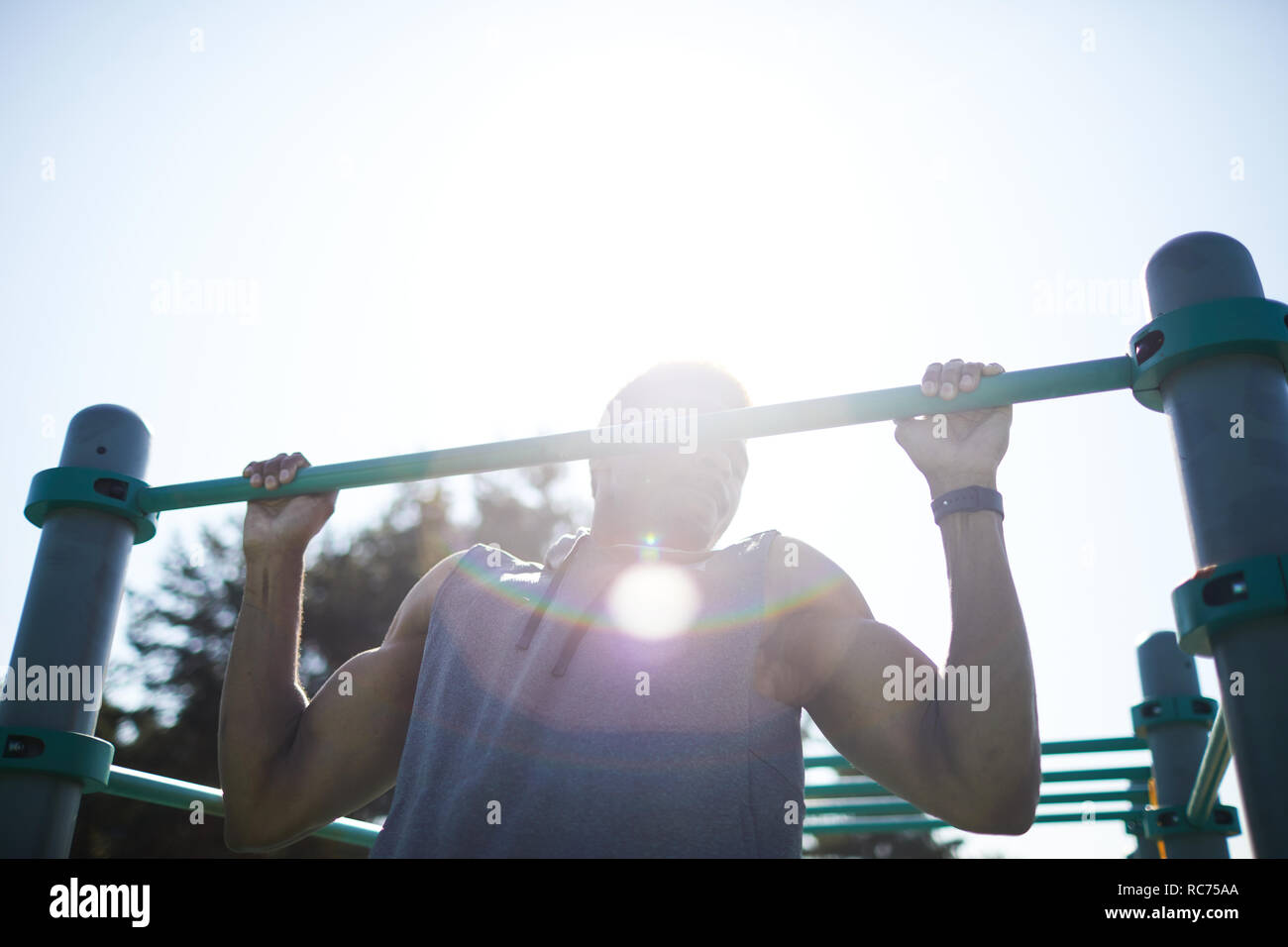 Strong black man doing workout exercise outdoors Stock Photo - Alamy