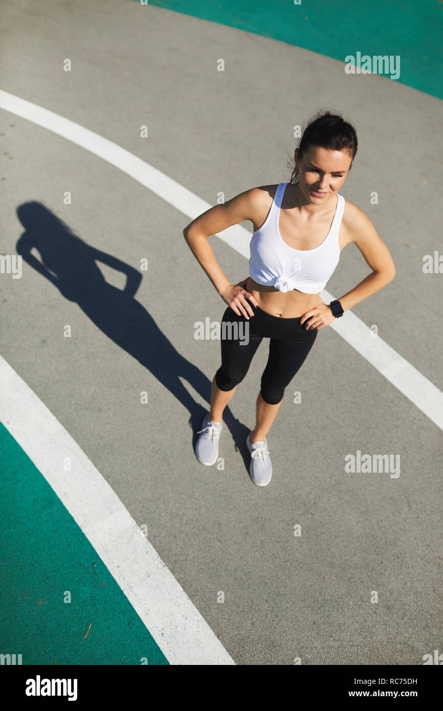 Young woman athlete stadium hi-res stock photography and images - Alamy