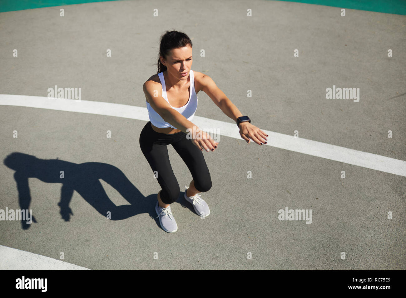 Lady doing squats hi-res stock photography and images - Alamy