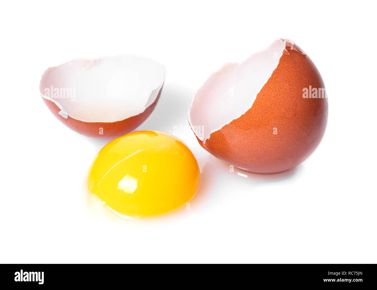broken chicken egg on white isolated background Stock Photo - Alamy