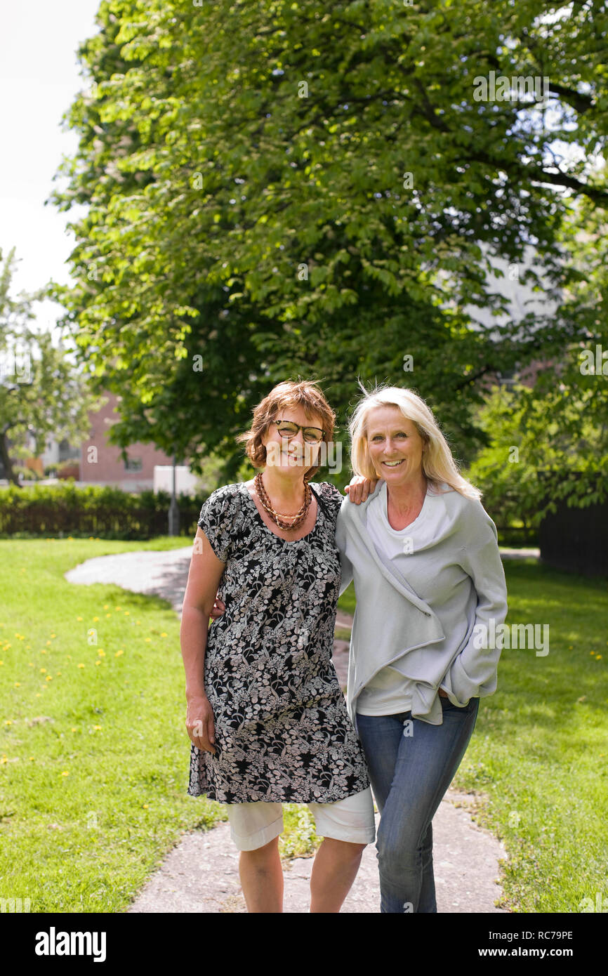 Two women together friends hi-res stock photography and images - Alamy