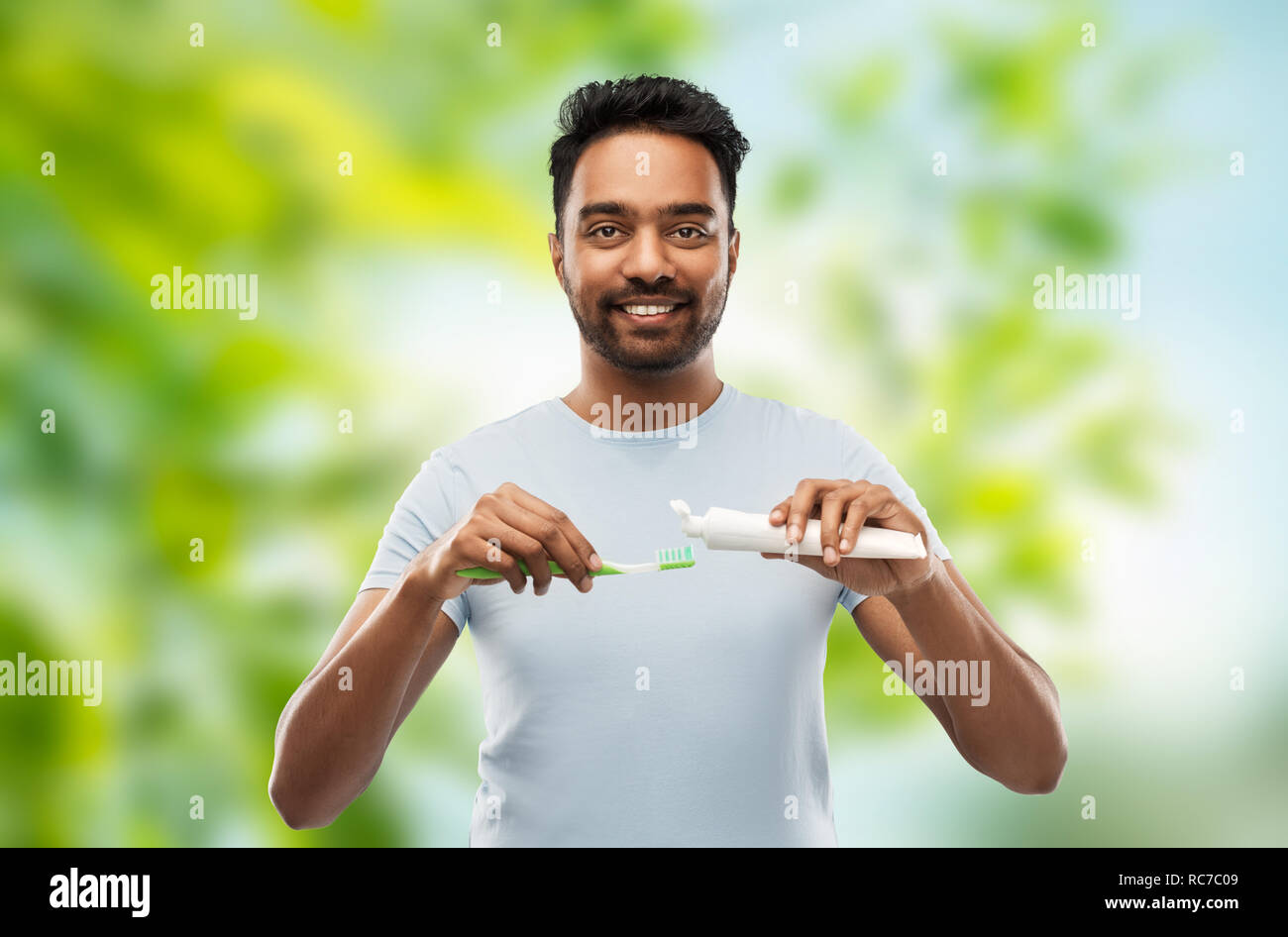 indian man with toothbrush and toothpaste Stock Photo - Alamy