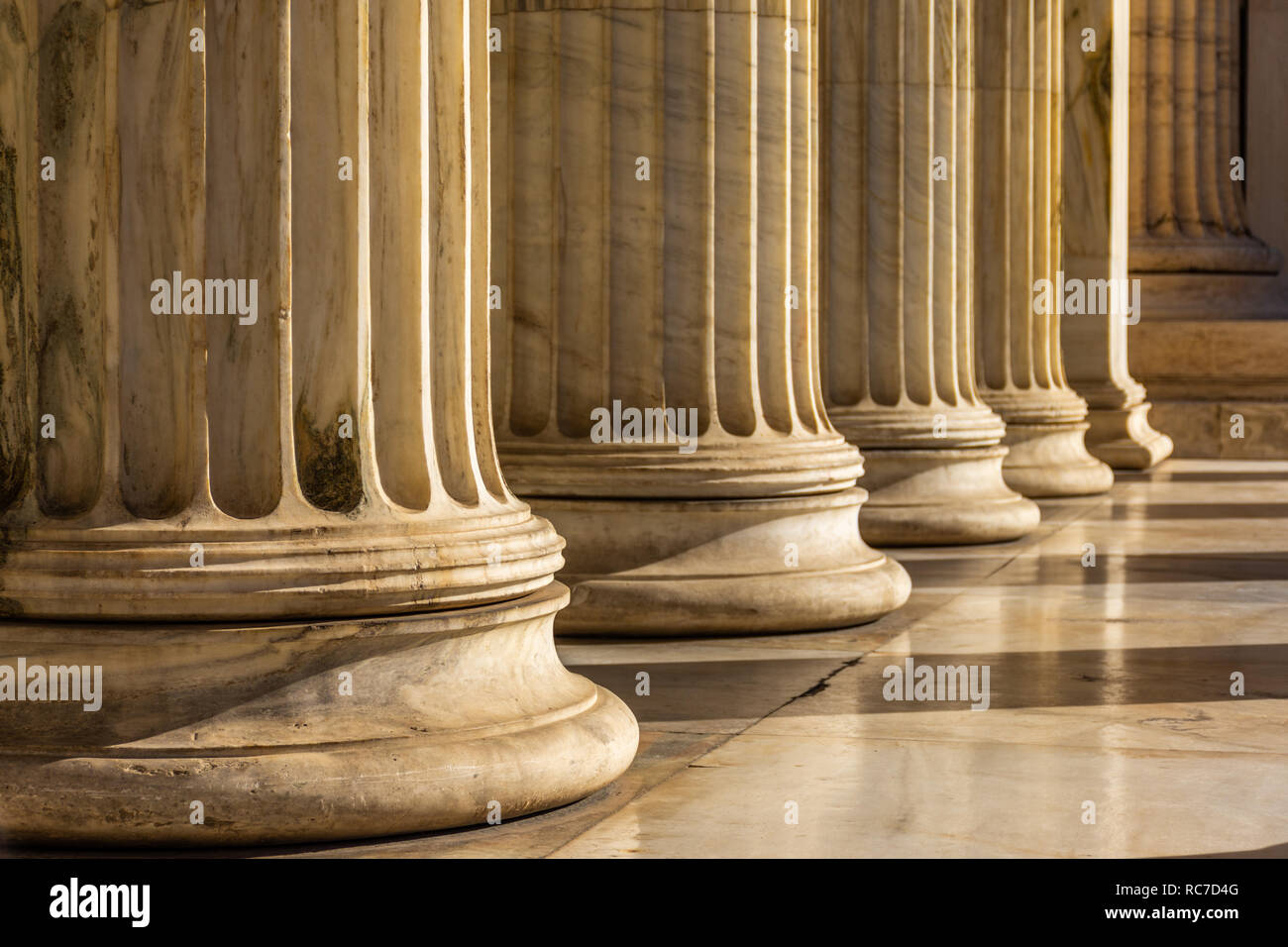 Classical marble pillars detail on the facade of National Academy of ...