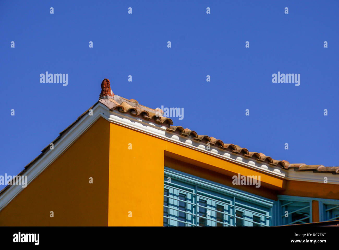 Building with orange stucco in Central Athens Stock Photo - Alamy