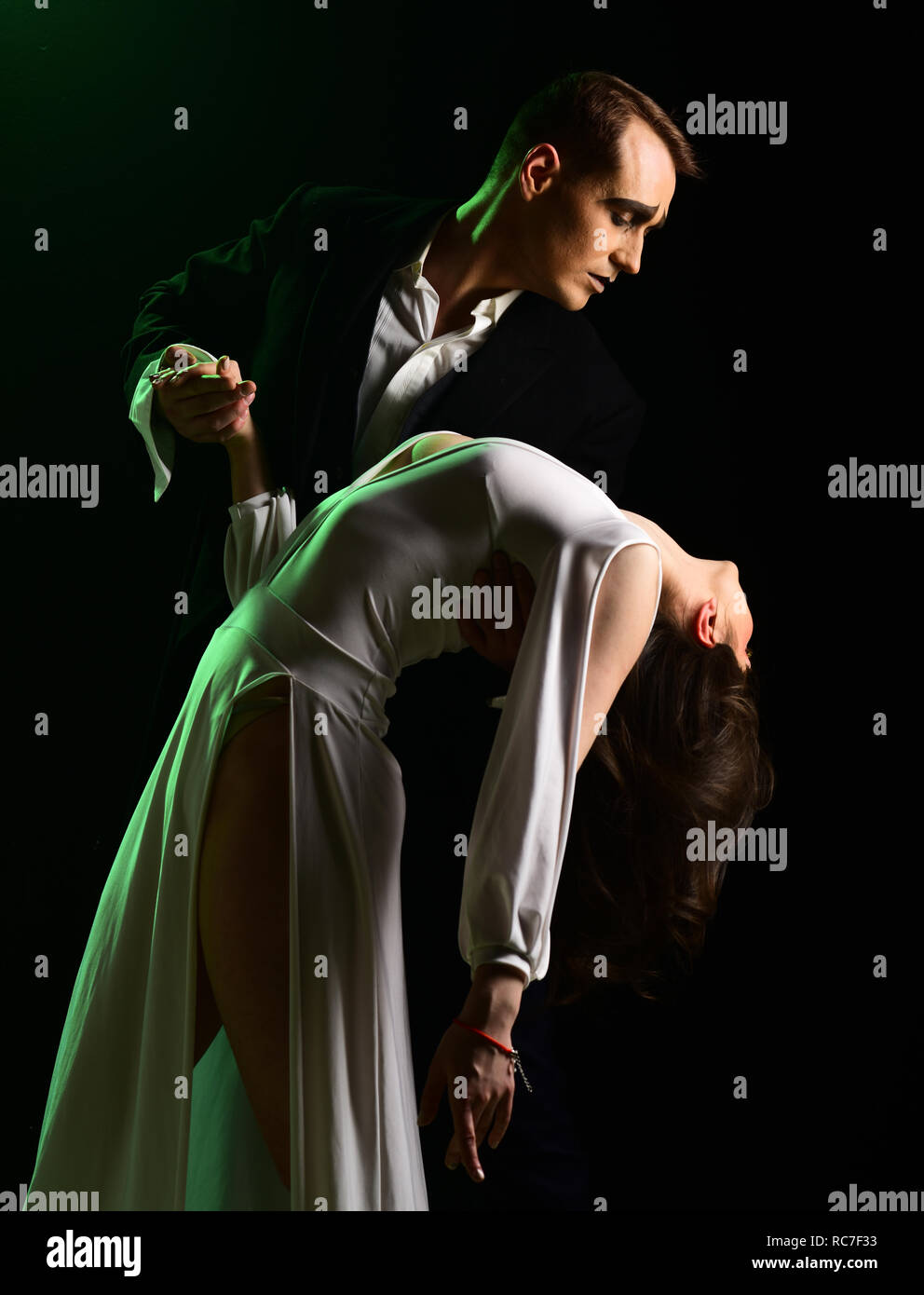 Couple miming hi-res stock photography and images - Alamy