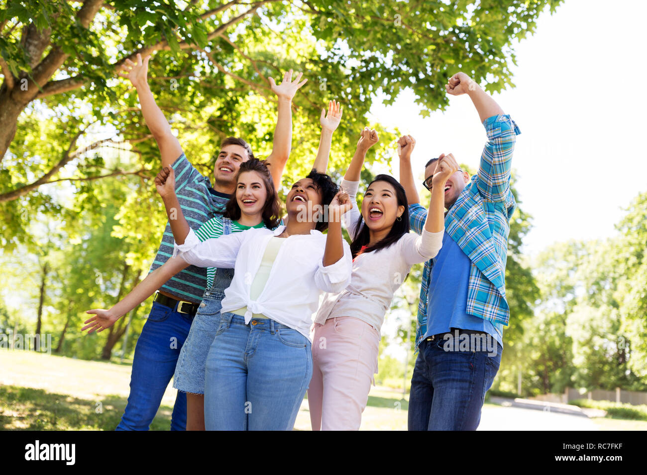 group of happy smiling friends having fun outdoors Stock Photo - Alamy